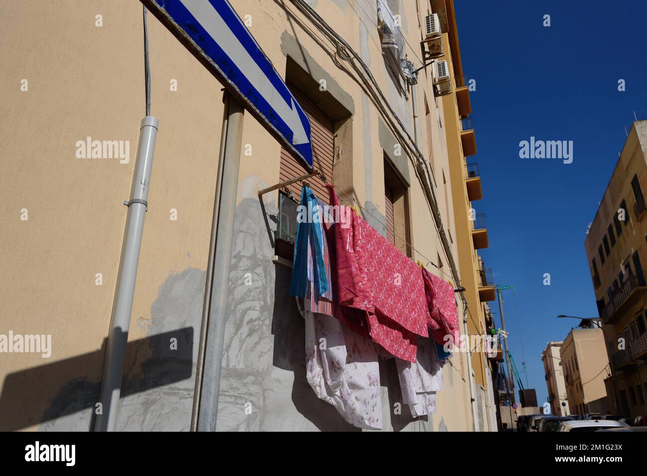 Drying bed linen on a cord Stock Photo - Alamy