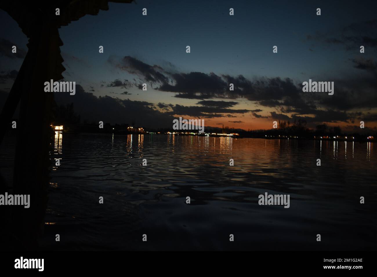 dawn at a lake with sky changing colors Stock Photo - Alamy