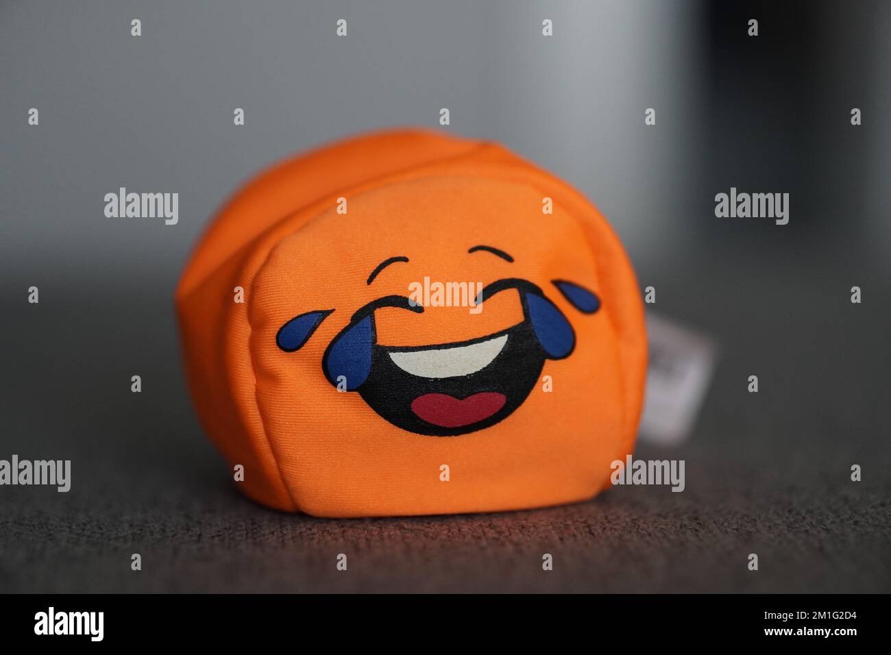 Happy face emoji toy hi-res stock photography and images - Alamy