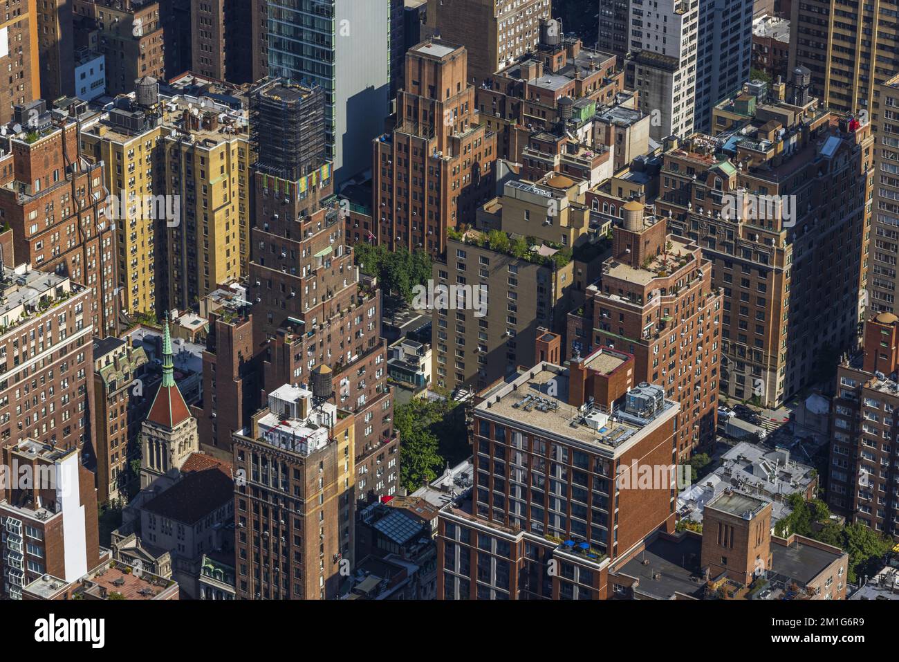 Beautiful view from above on roofs of skyscraper buildings with seating ...