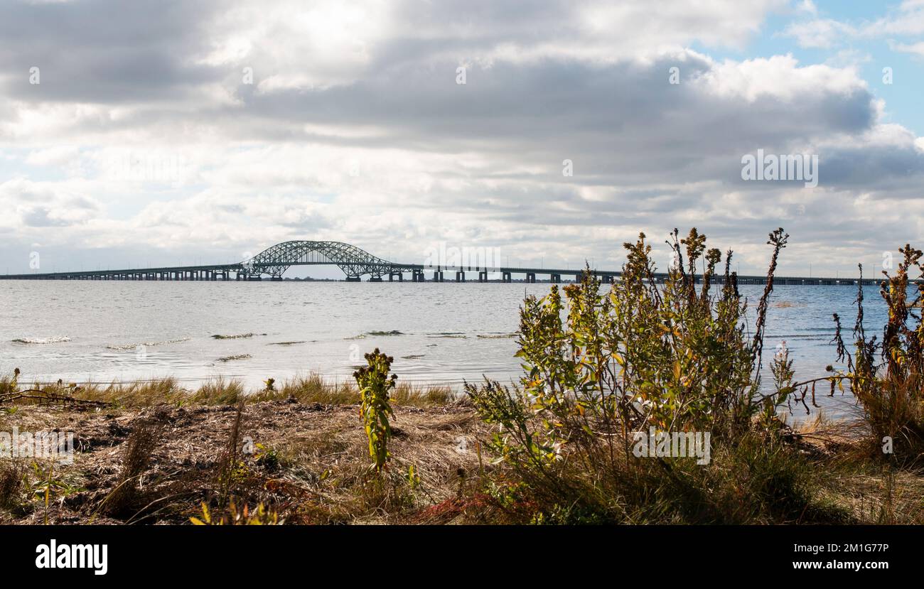Looking at the Great South Bay bridges from a marshy area on the water at Gardiners Park Bay ...