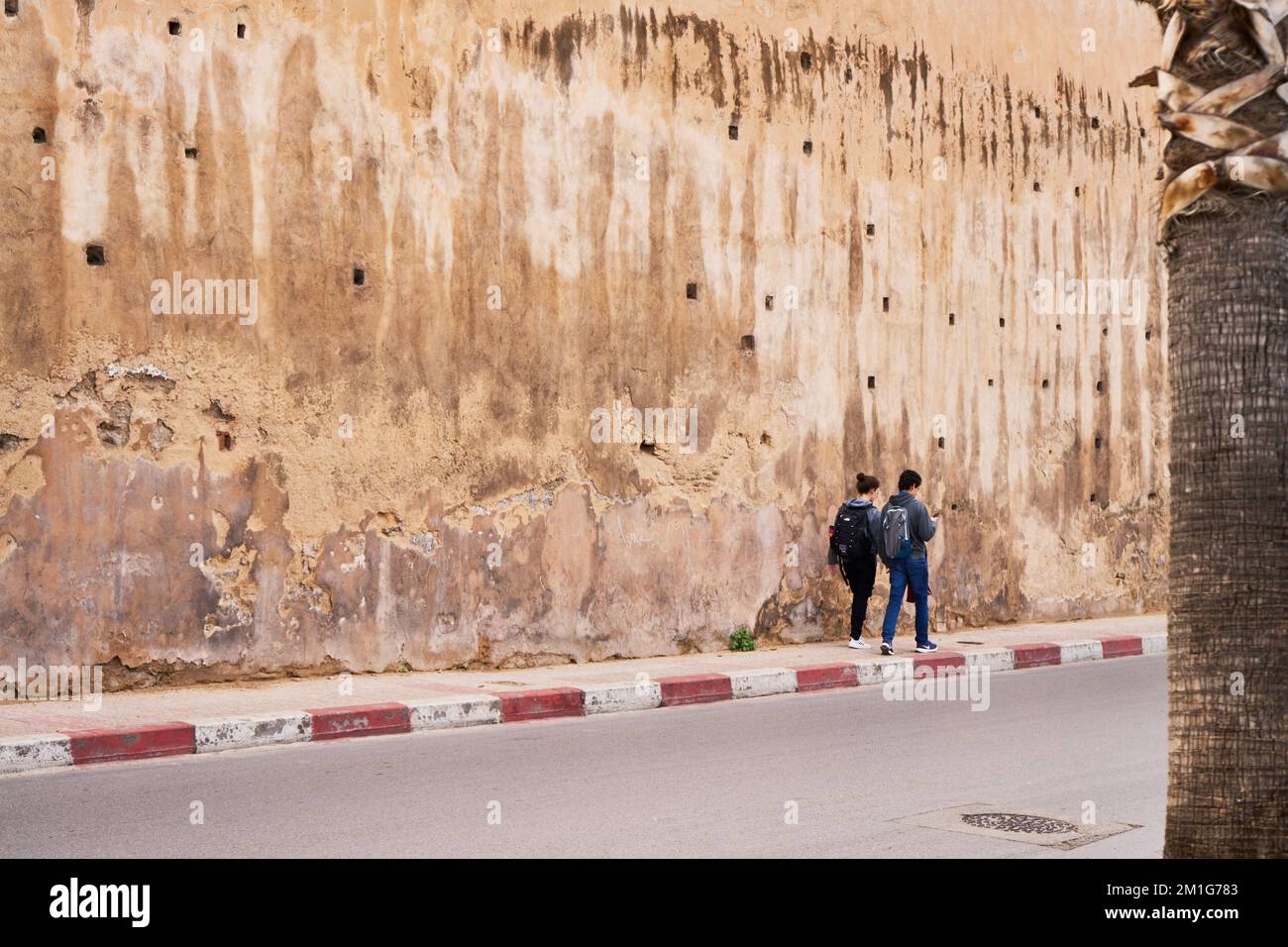 two students walking in the street Stock Photo - Alamy