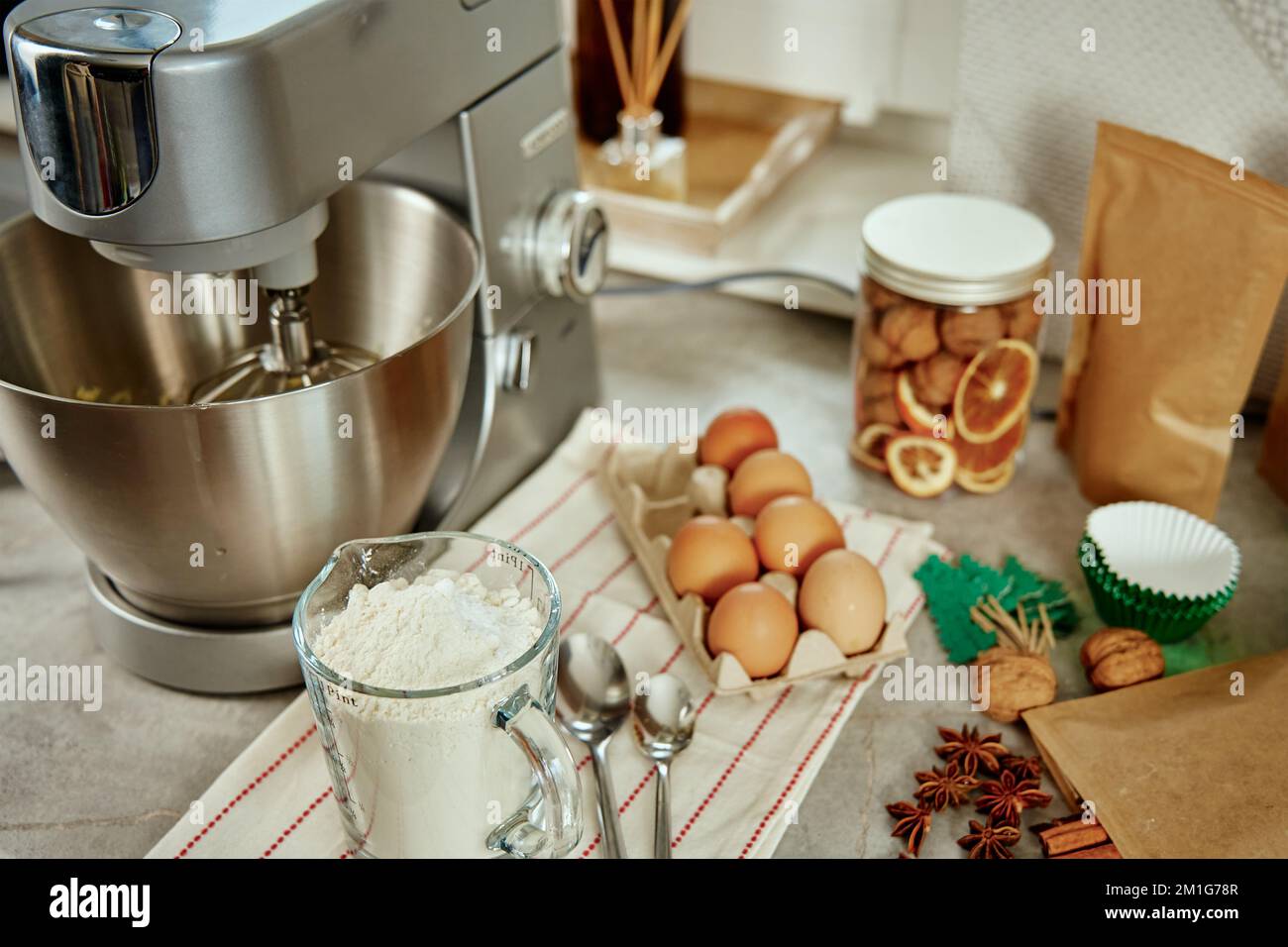 Preparation of dough in an electric mixer at home. Professional mixer ...