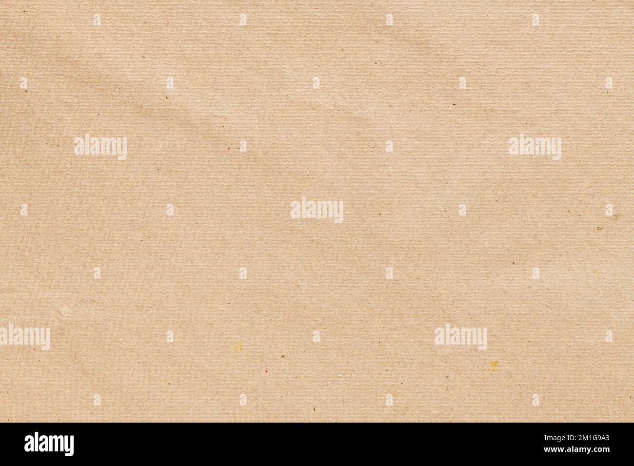 Paper background in beige color tone Stock Photo - Alamy