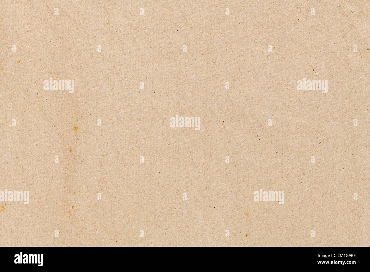 Paper background in beige color tone Stock Photo - Alamy