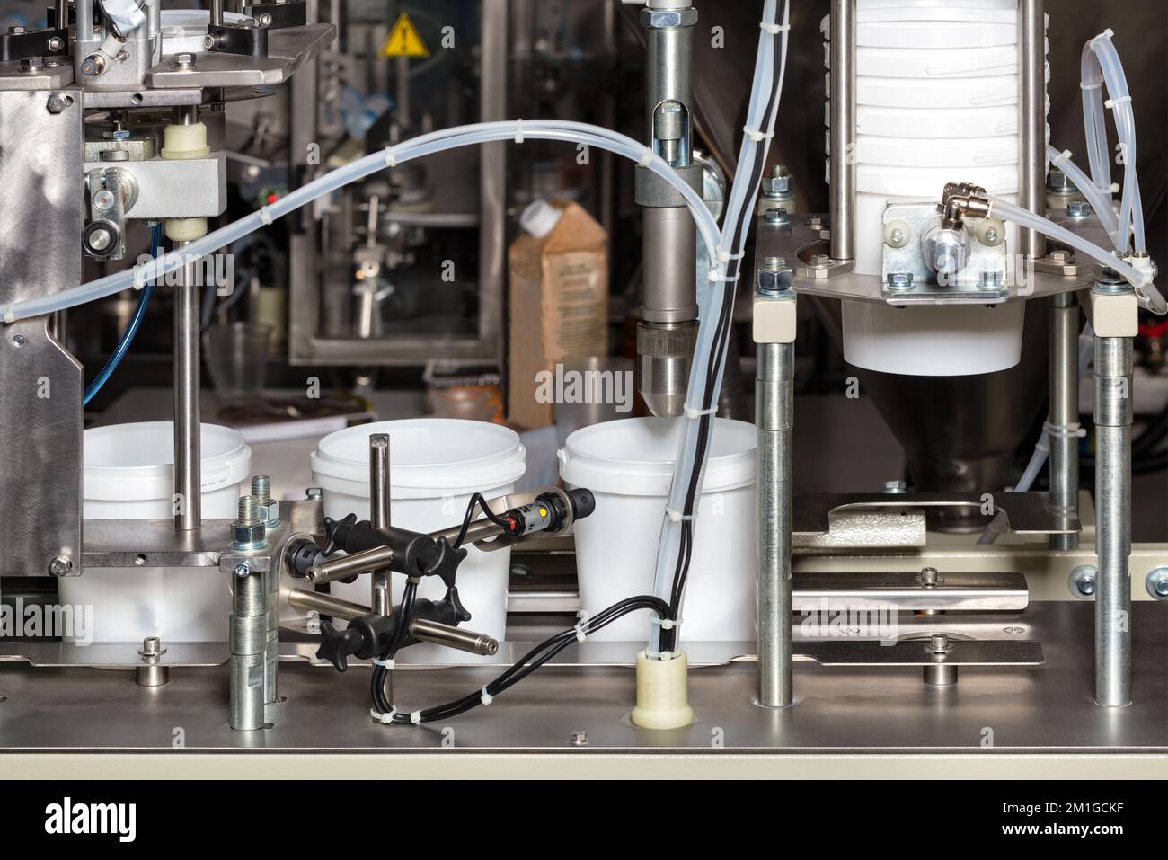 A fragment of a production line, an automatic conveyor for filling food ...