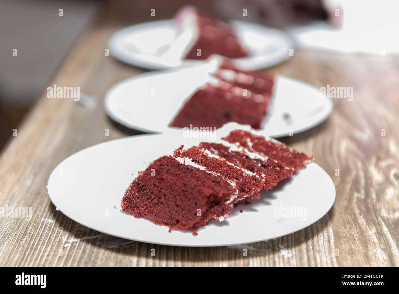 Small slices of the birthday cake on plates for everyone to eat Stock ...