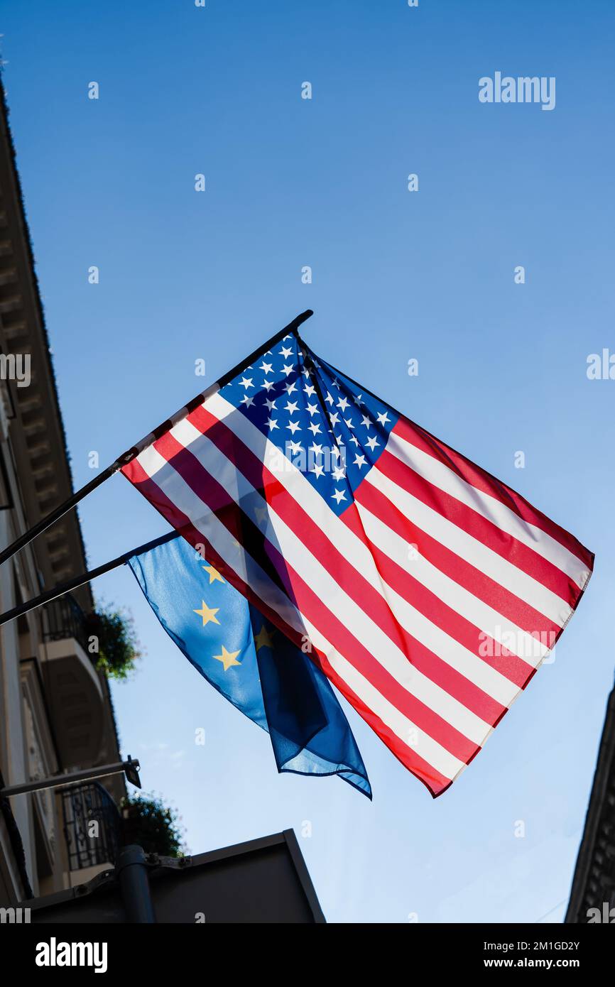 Flags of USA and European union on the building of united states ...
