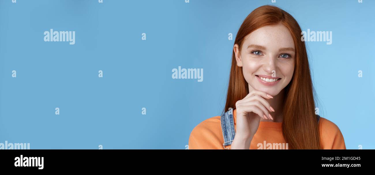 Curious smart creative young female redhead blue eyes have perfect idea ...