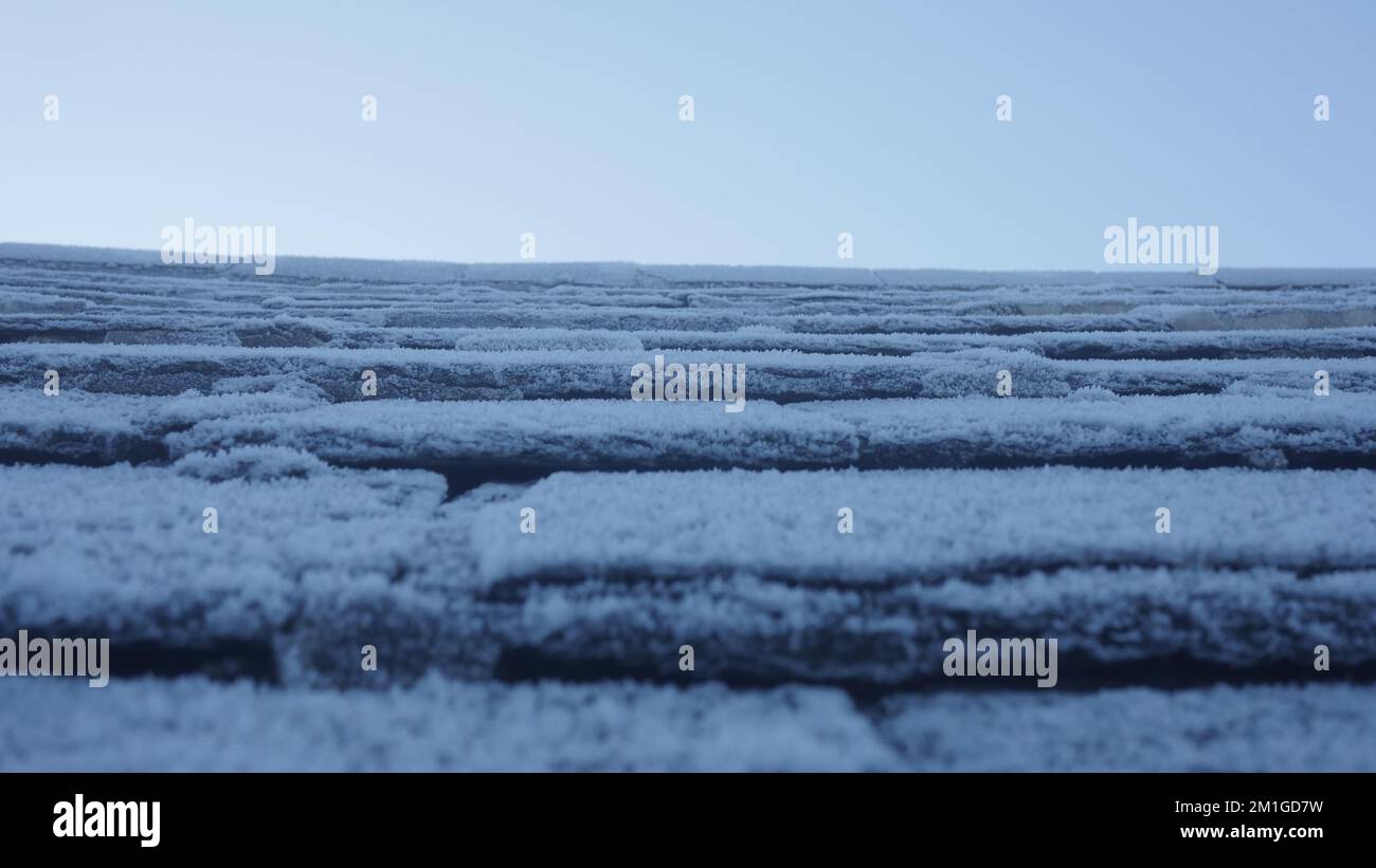 A Liscannor stone roof covered in a heavy layer of frost Stock Photo ...