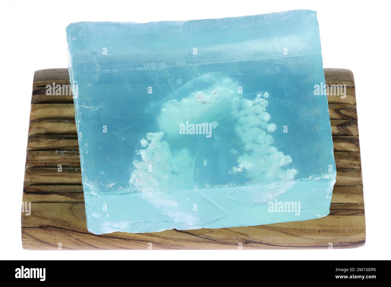 Dead Sea salt soap on olive wood underlay isolated on white background ...