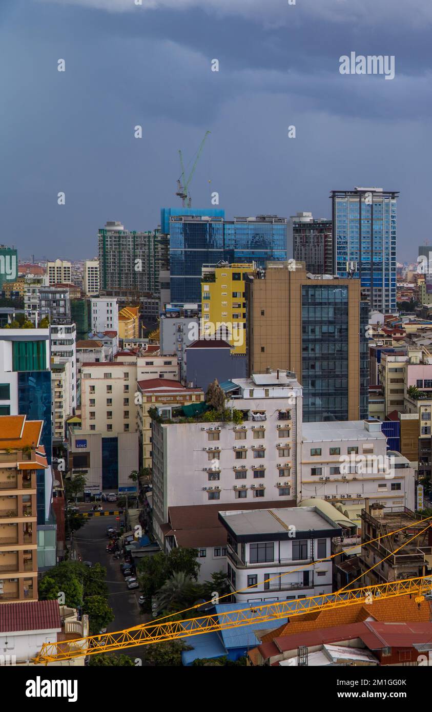 An aerial cityscape view of downtown Phnom Penh at blue sunset sky ...