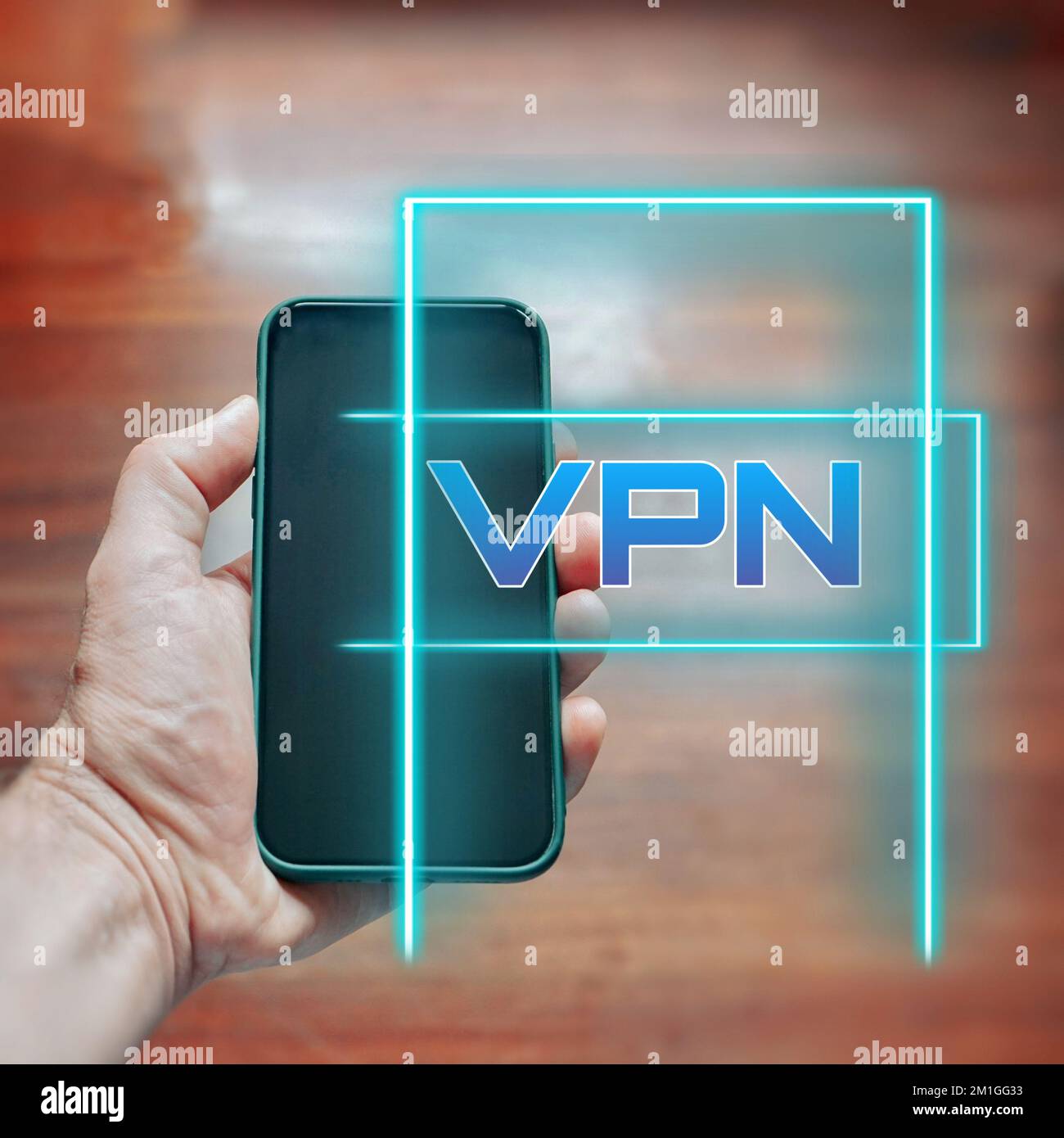 hand holding a smart phone with vpn icon Stock Photo - Alamy