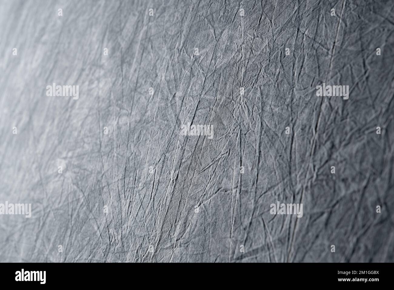 Abstract grey background design of wrinkled light fabric, grunge. Close ...