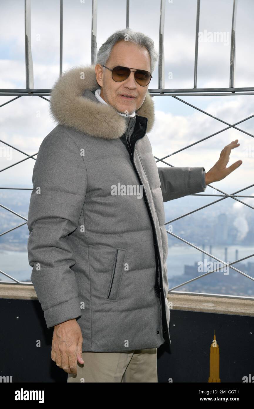 Italian tenor Andrea Bocelli poses on the 86th floor observation deck ...