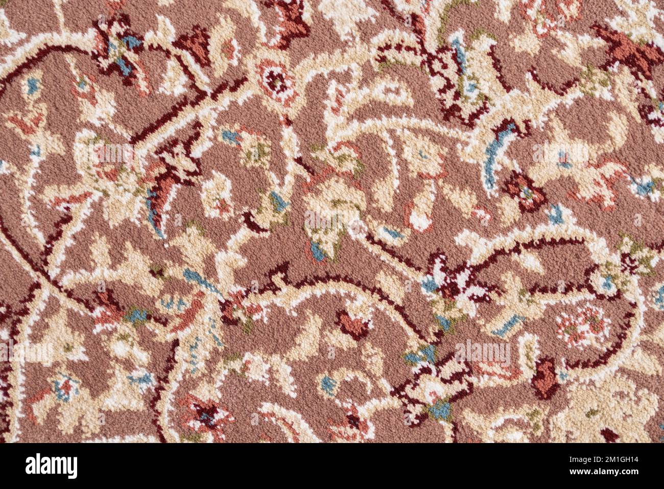 Fragment of persian carpet texture with floral print. Close up of ...