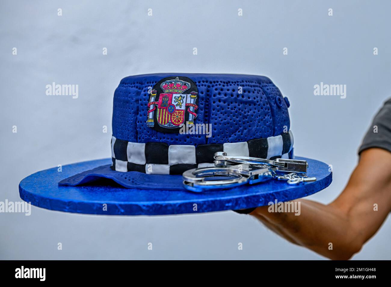 Handmade cake in the shape of a police cap Stock Photo - Alamy