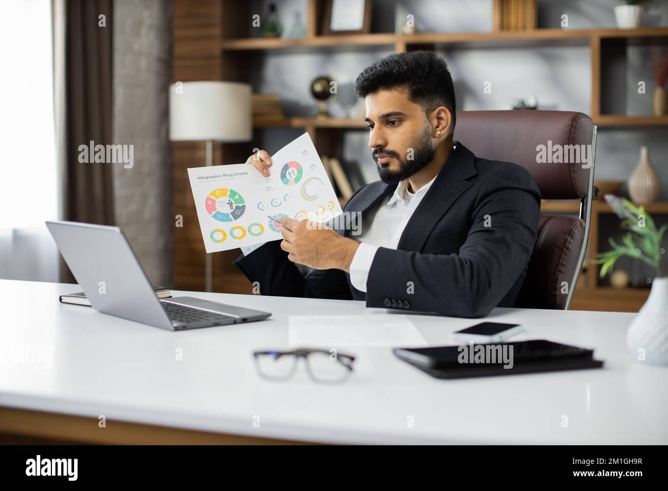 Male teacher explaining graphs on hi-res stock photography and images ...
