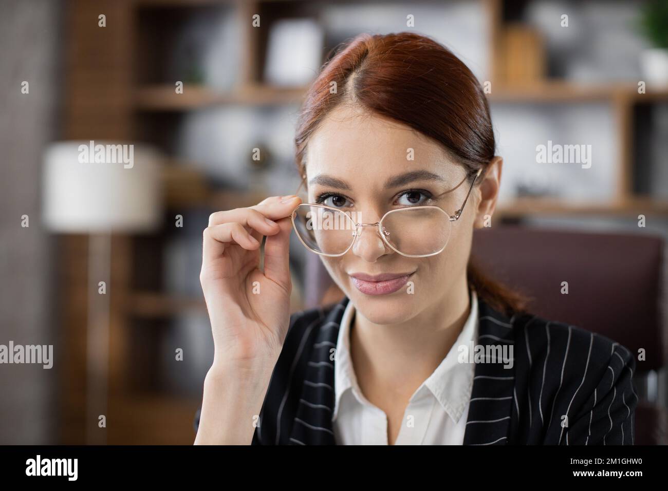 Close up portrait of cheerful business male boss in glasses, suit and ...