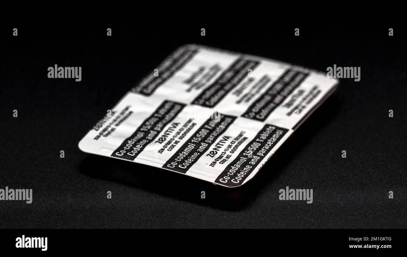 Blister pack of Co-Codamol pain relief tablets on a black background ...