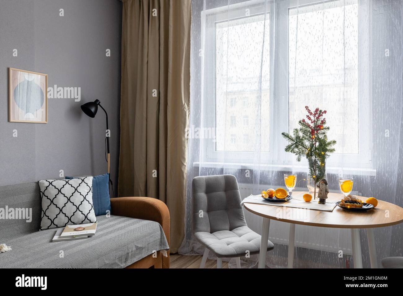 Photo of a cozy apartment with New Year decor Stock Photo - Alamy