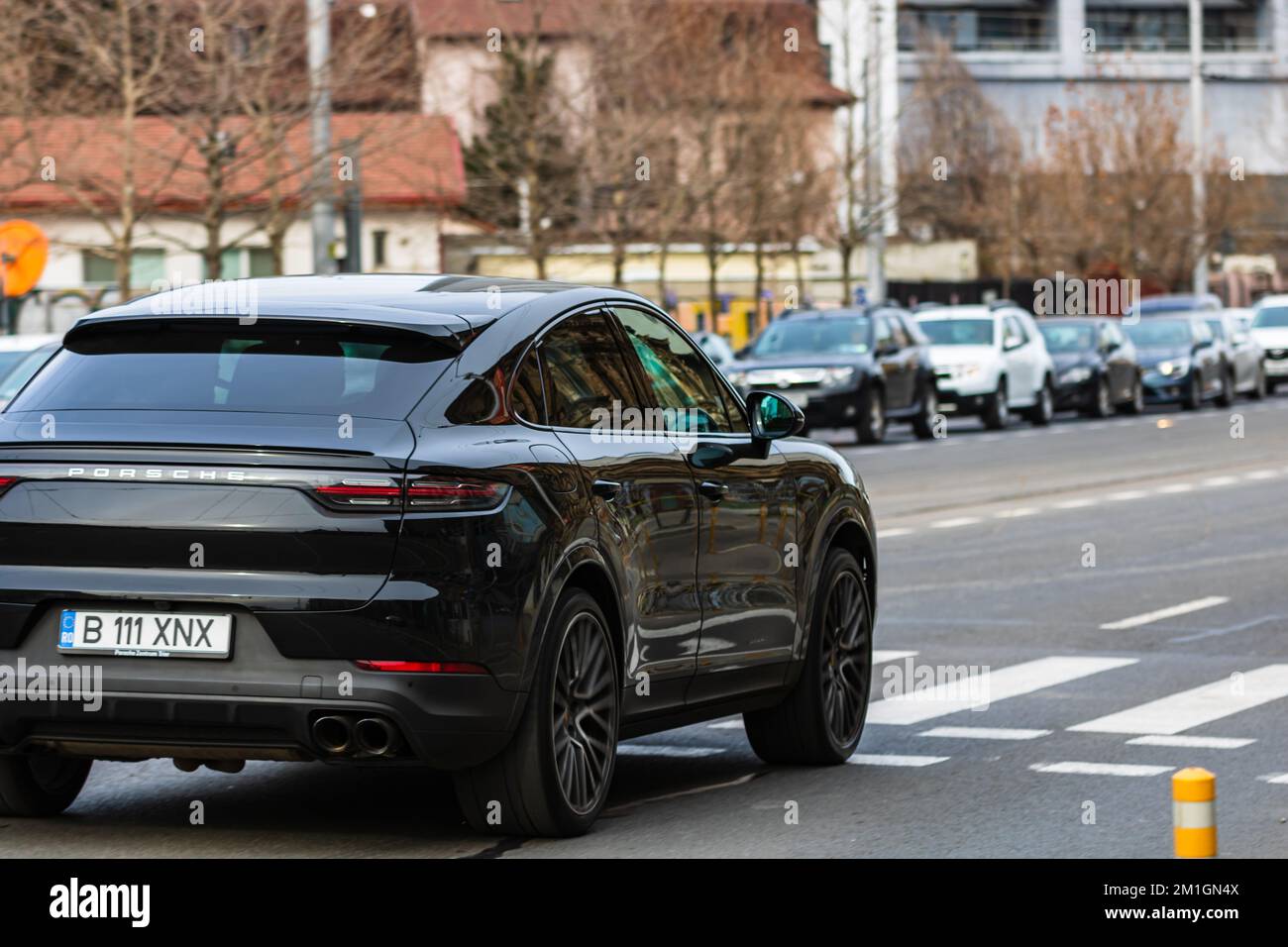 Porsche luxury car in traffic in Bucharest, Romania, 2022 Stock Photo ...