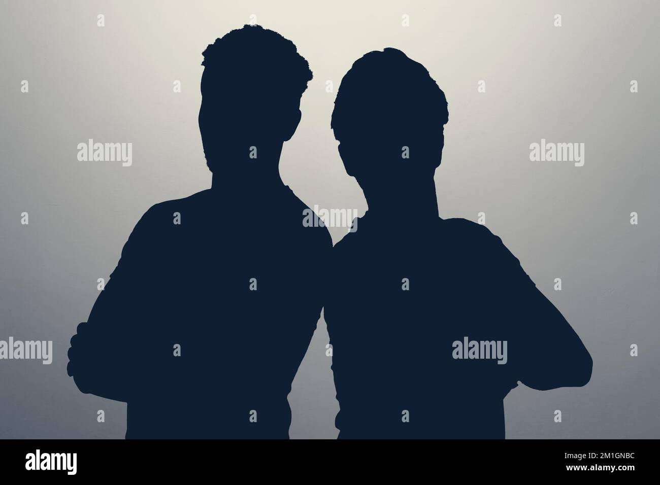 Two men standing together staying anonym hiding their identity Stock ...
