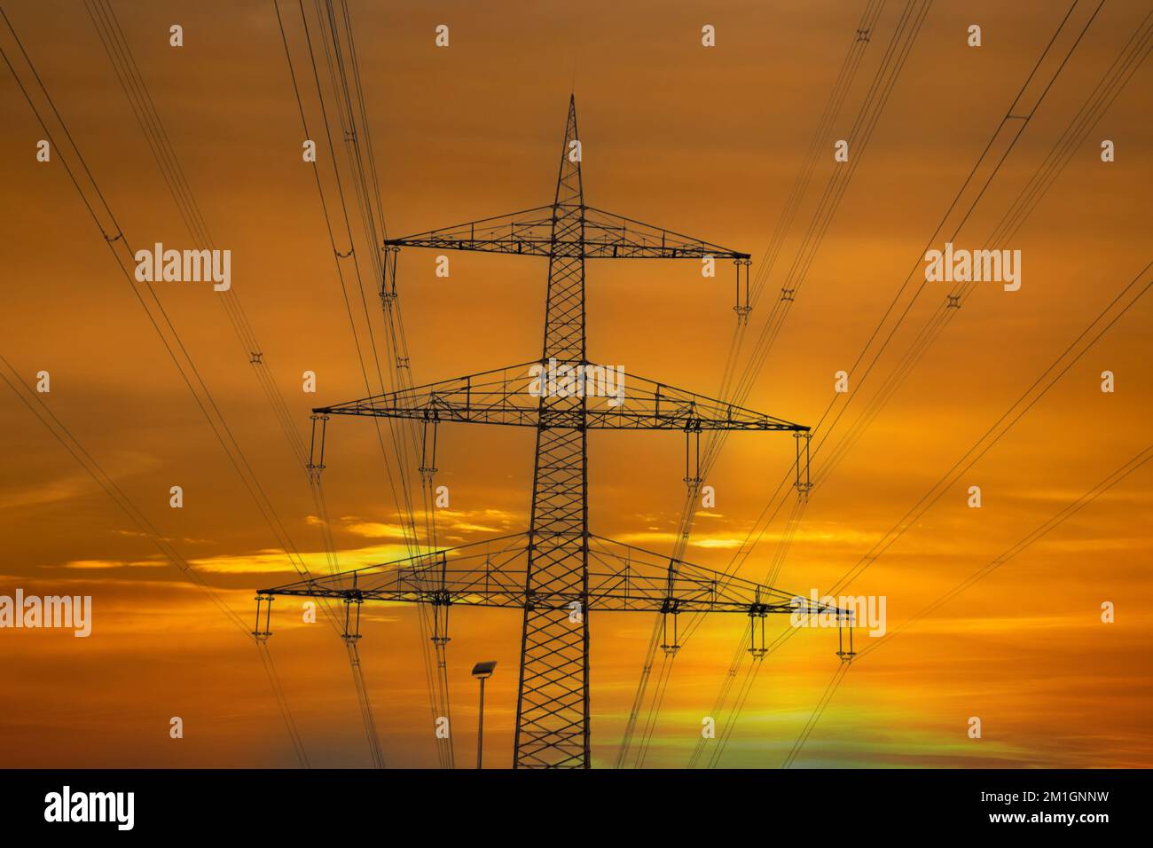 Power line in front of a beautiful evening sky Stock Photo - Alamy