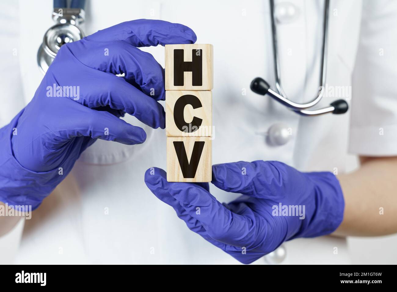 Medicine and health concept. The doctor holds cubes in his hands on ...