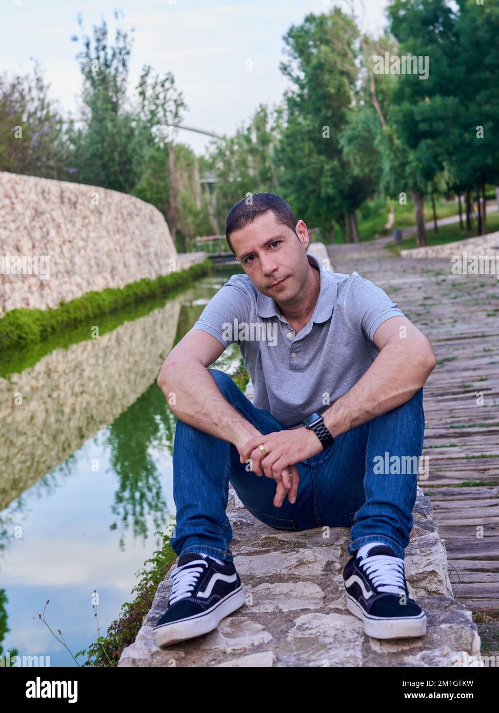 Man smiling next river hi-res stock photography and images - Alamy