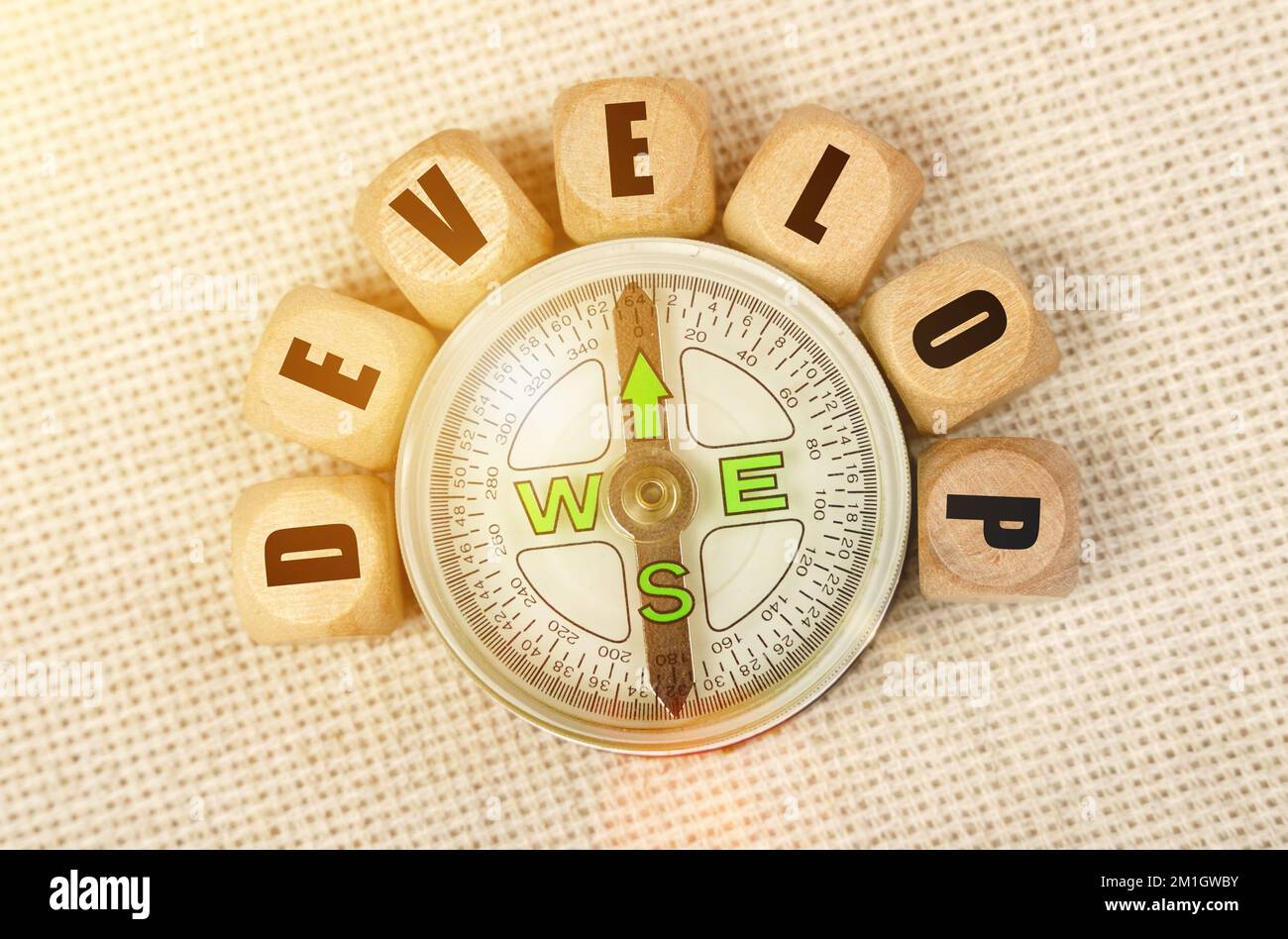 Business concept. On the table is a compass and cubes with the ...