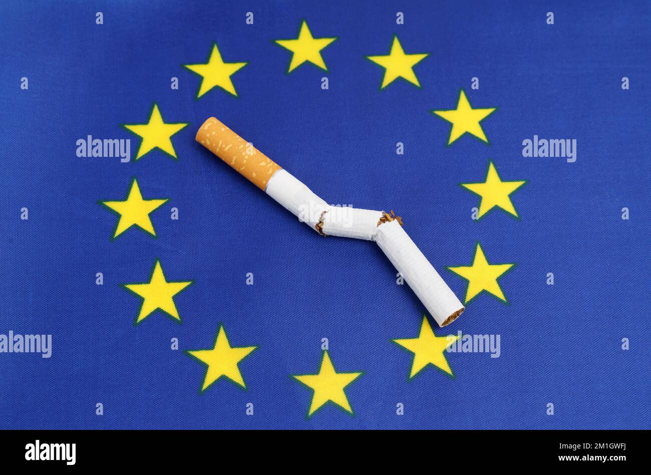 No smoking concept. A broken cigarette is on the flag of the European ...