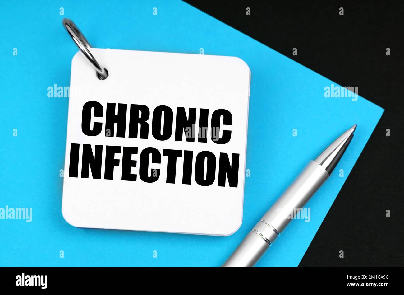 Medicine and health concept. On the black surface lies blue paper, a ...