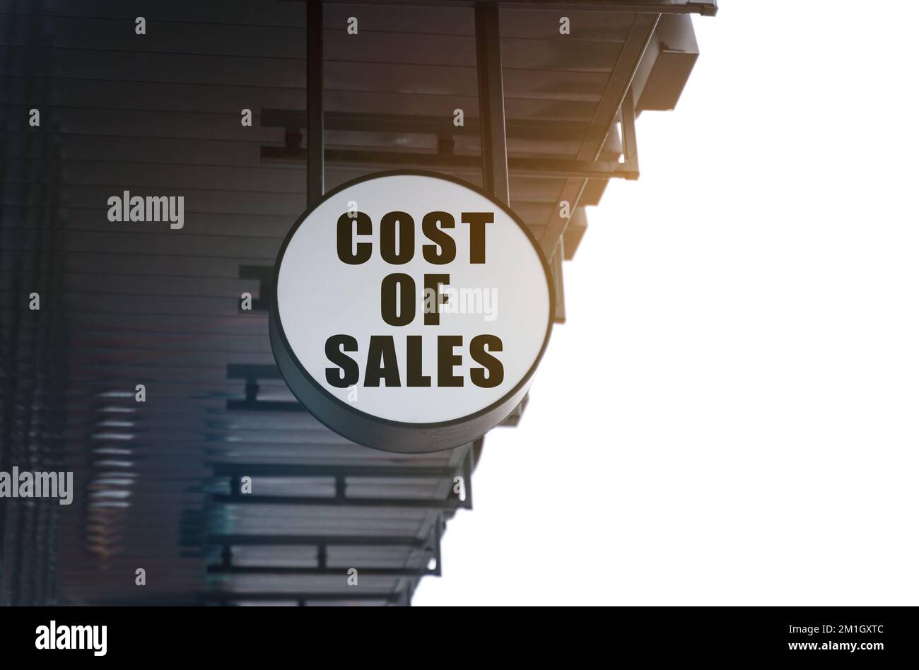 Business and Economics. There is a circular sign under the roof of the ...