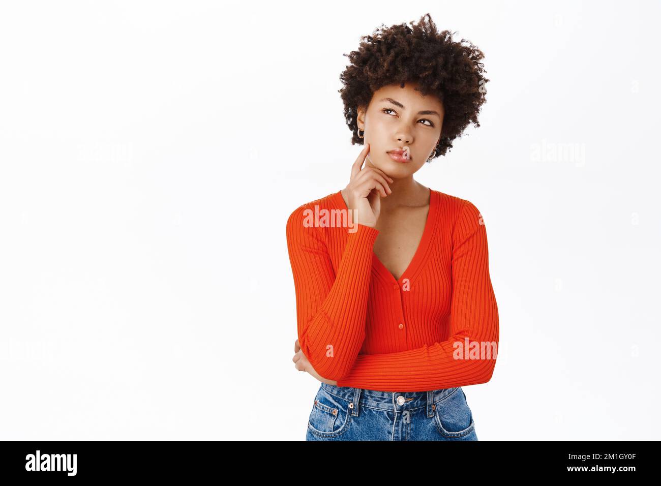 Image of beautiful female student thinking, woman ponders smth, makes ...