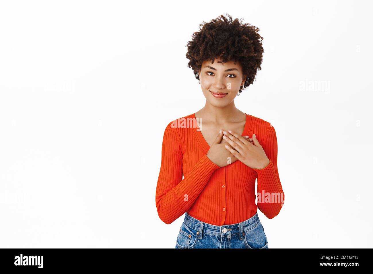 Black woman hand over heart hi-res stock photography and images - Alamy