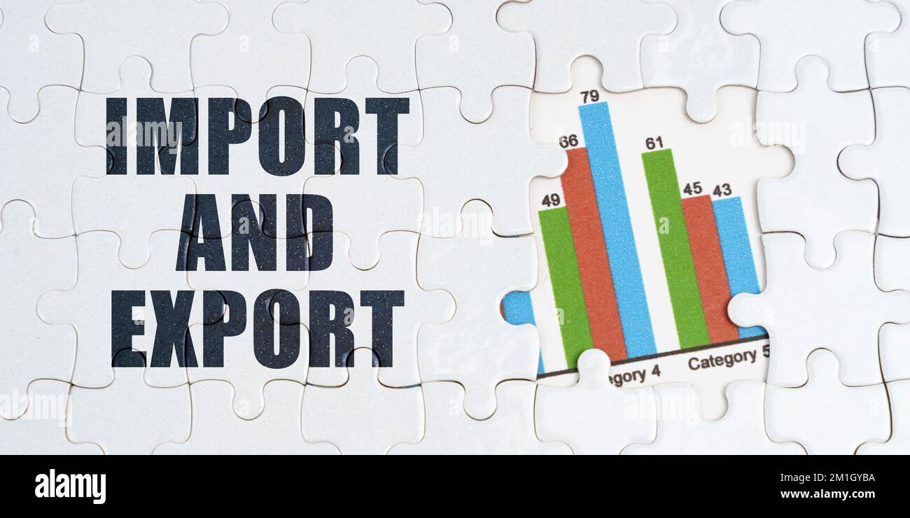 Economy and business concept. On white puzzles there is an inscription ...