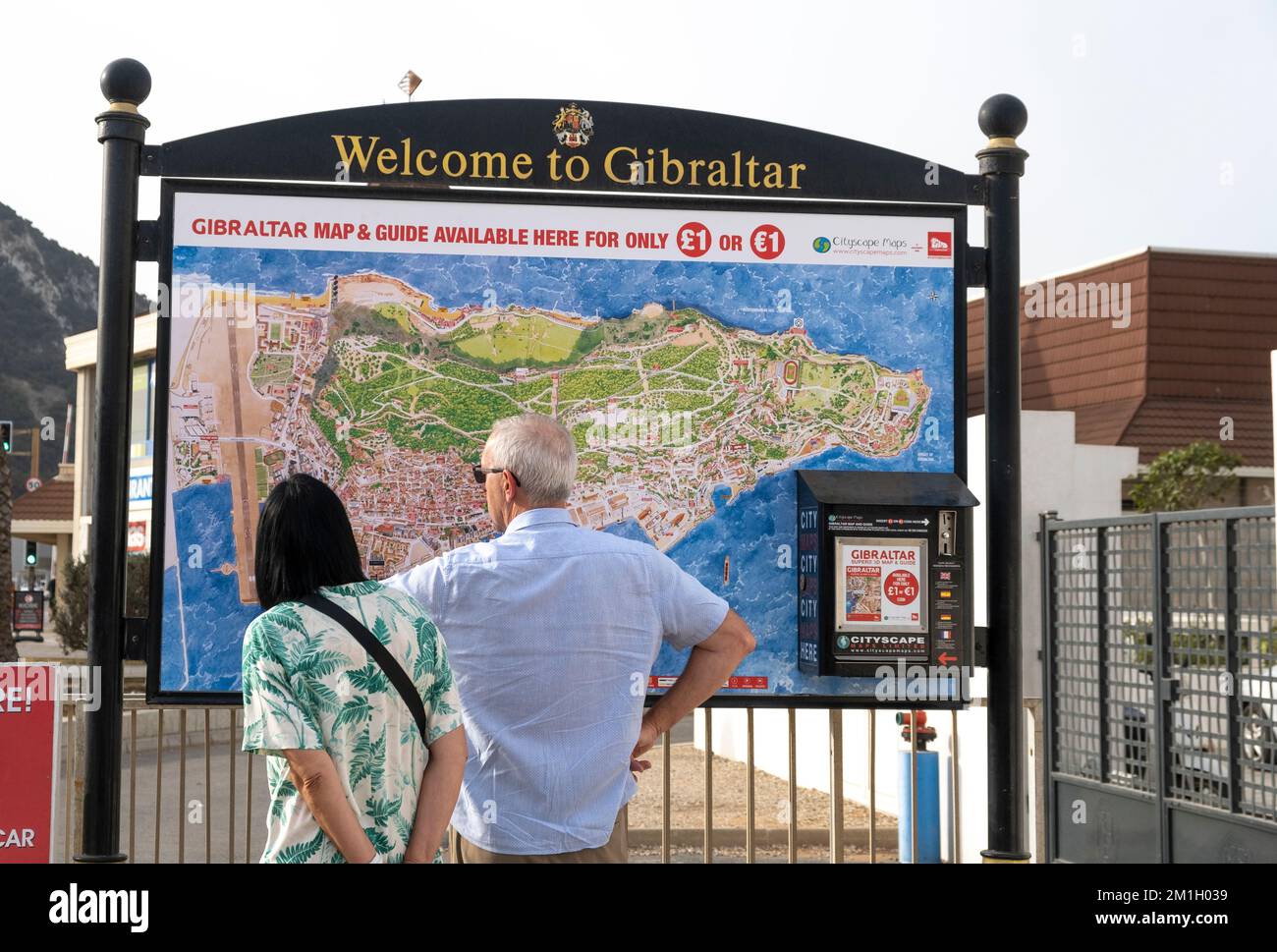 Gibraltar. 26th October 2022. Older couple looking at a large map of ...