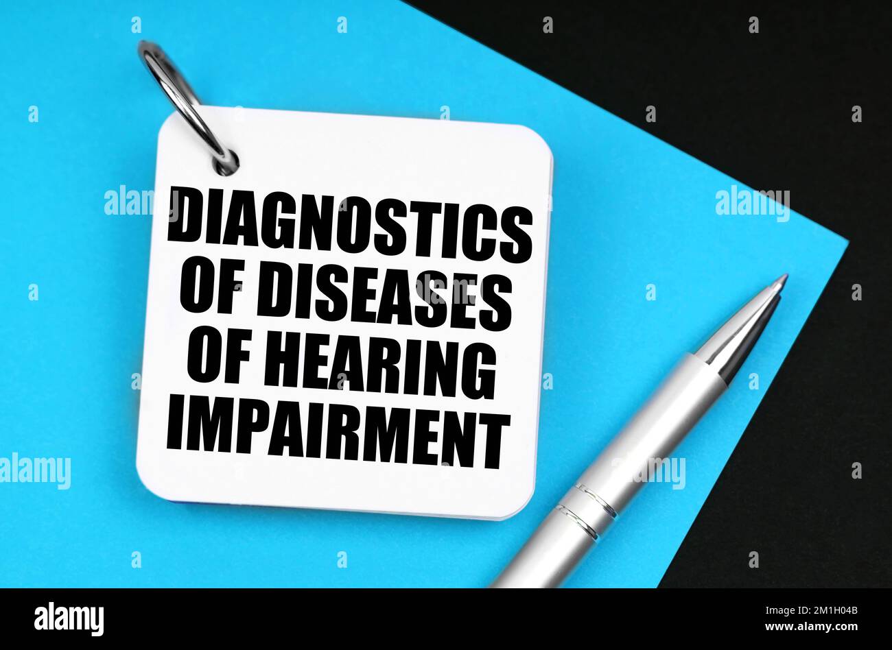 Medicine and health concept. On the black surface lies blue paper, a ...