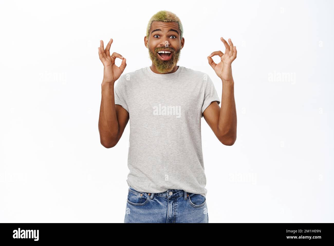 Awesome, amazing product. Excited smiling black man with yellow beard ...