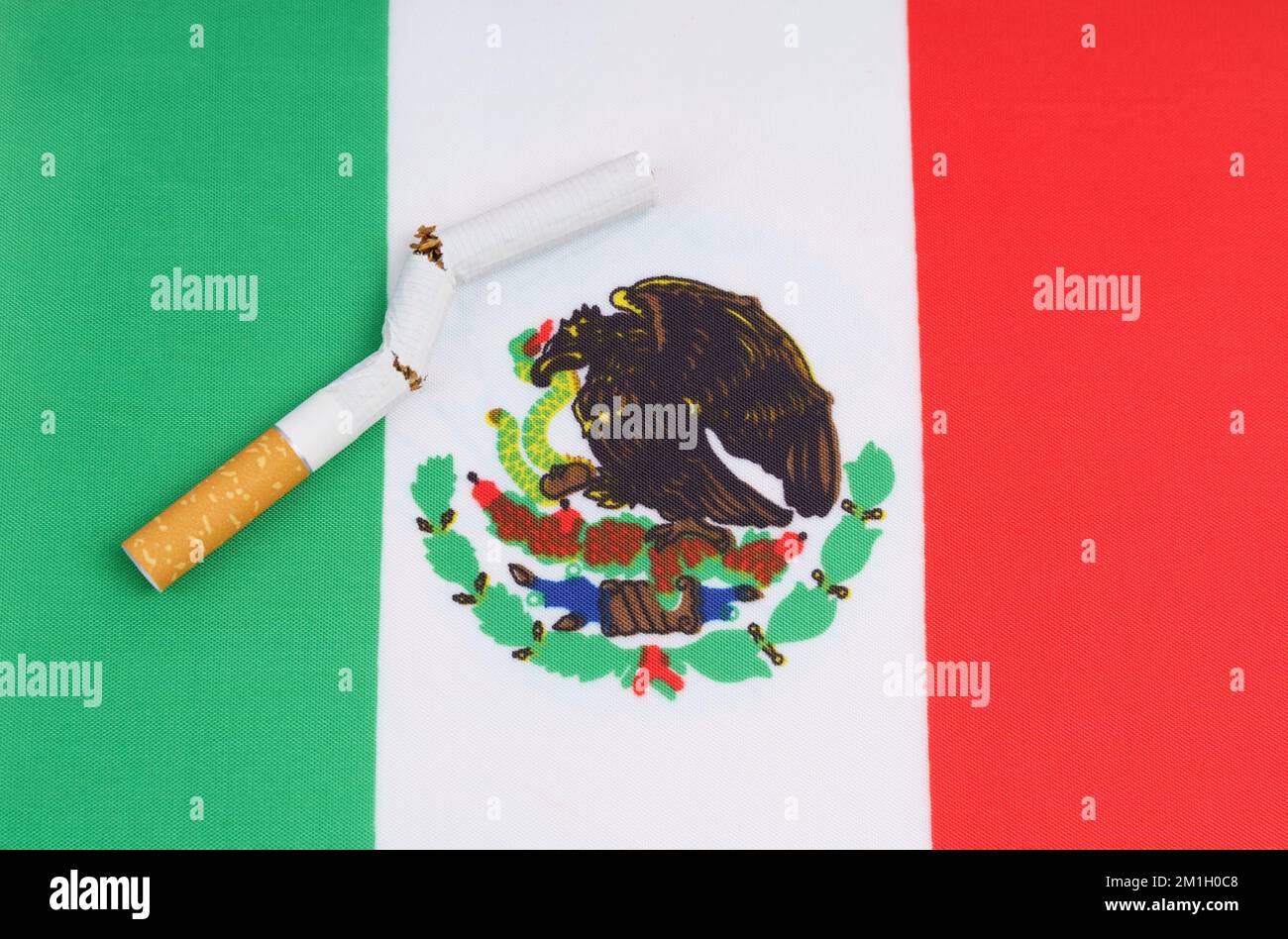 No smoking concept. The flag of Mexico has a broken cigarette as a ...
