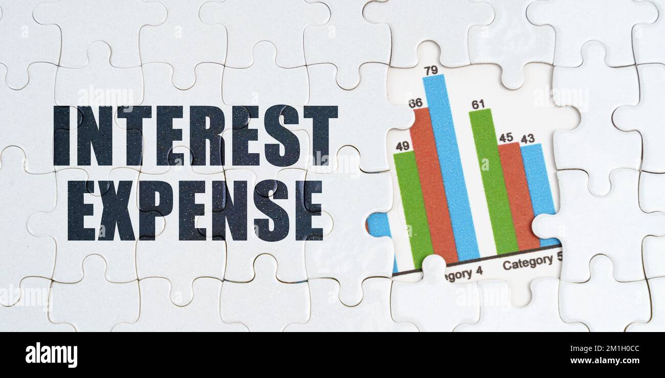 Economy and business concept. On white puzzles there is an inscription ...