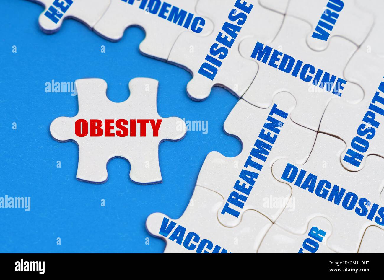 Medicine and health concept. On the blue surface, puzzles with medical ...