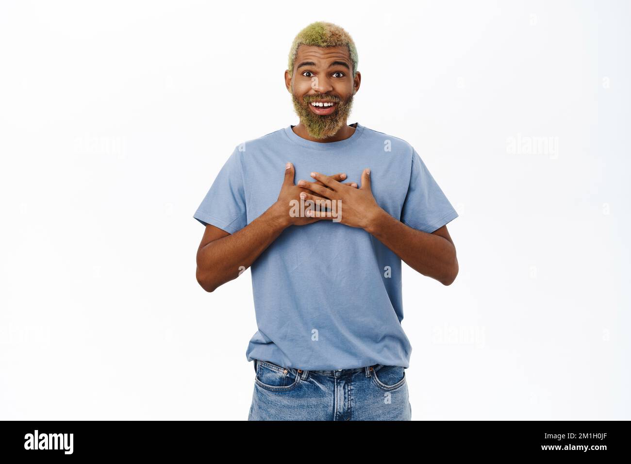 Portrait of surprised happy guy, looks with disbelief and appreciation ...