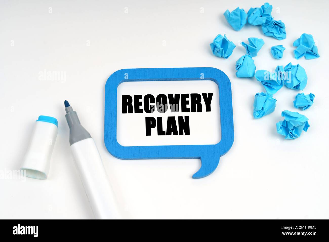 Medicine and health. On a white surface are crumpled blue paper, a ...