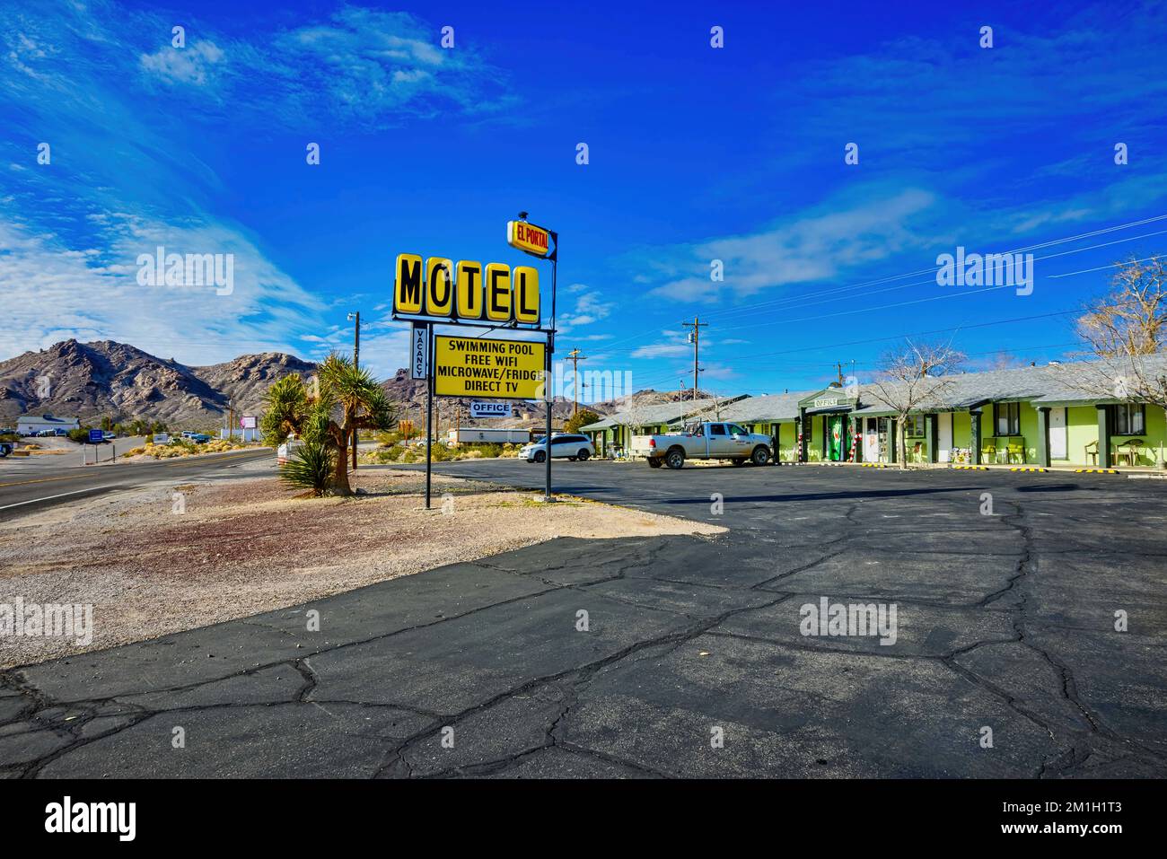 The signs on the street under a blue sky in Beatty, Nevada, United ...