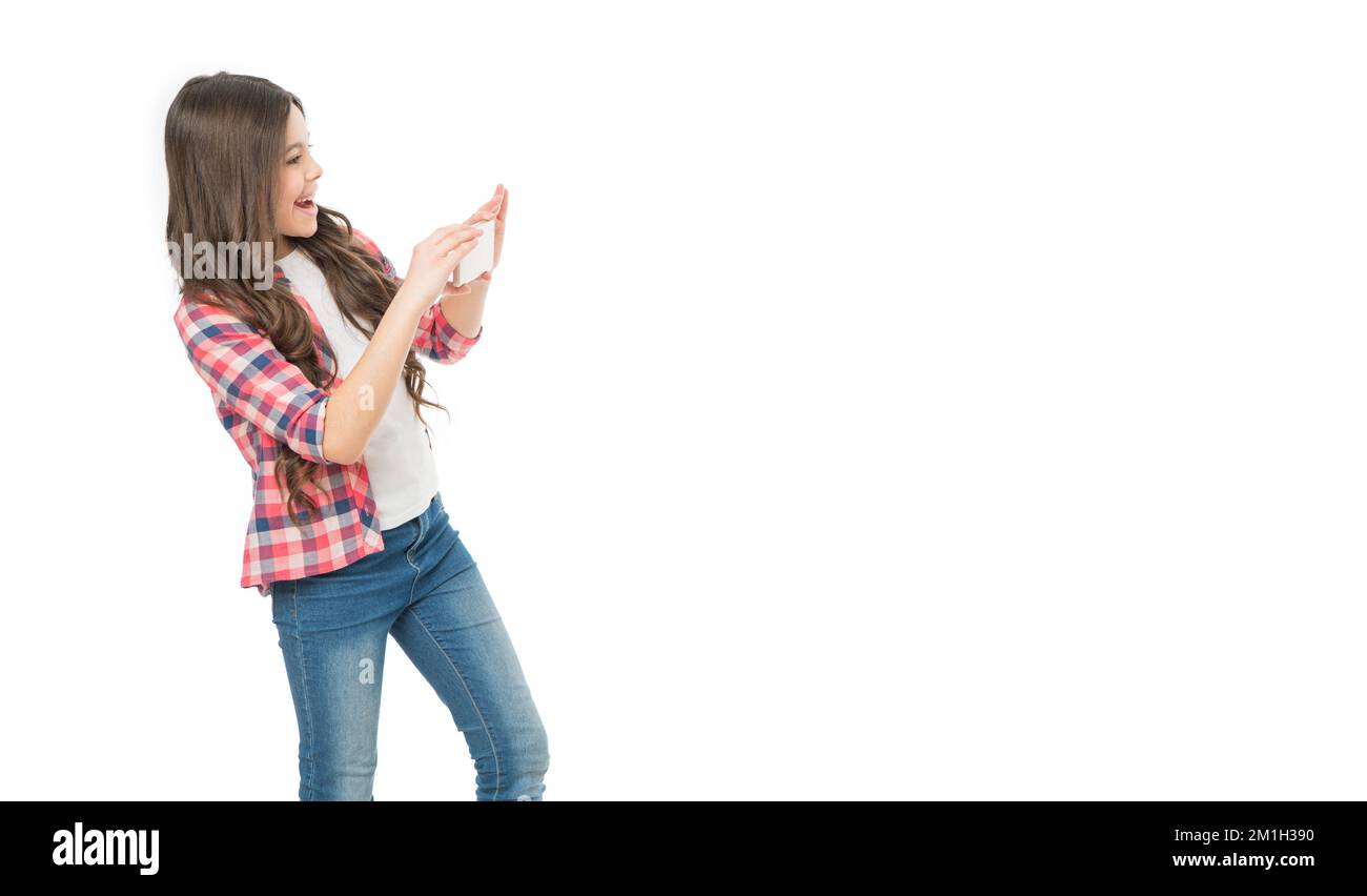 happy teen girl blogger with phone isolated on white background ...