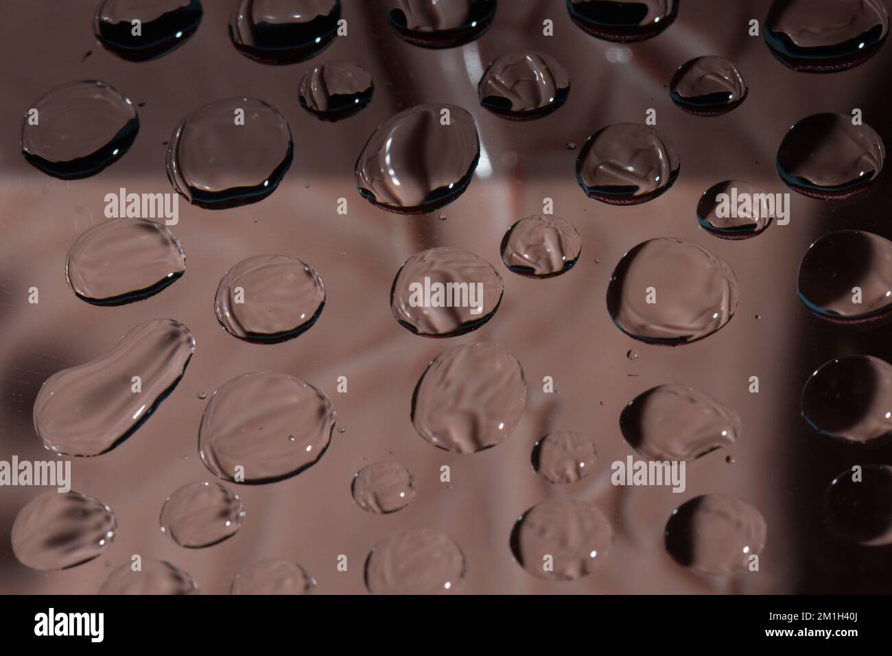 Raindrop refraction hi-res stock photography and images - Alamy