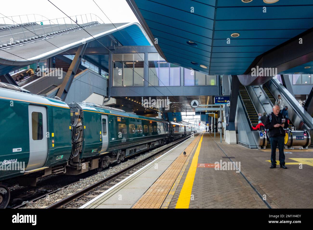 A view along the platform at Reading Railway Station in Berkshire, UK ...