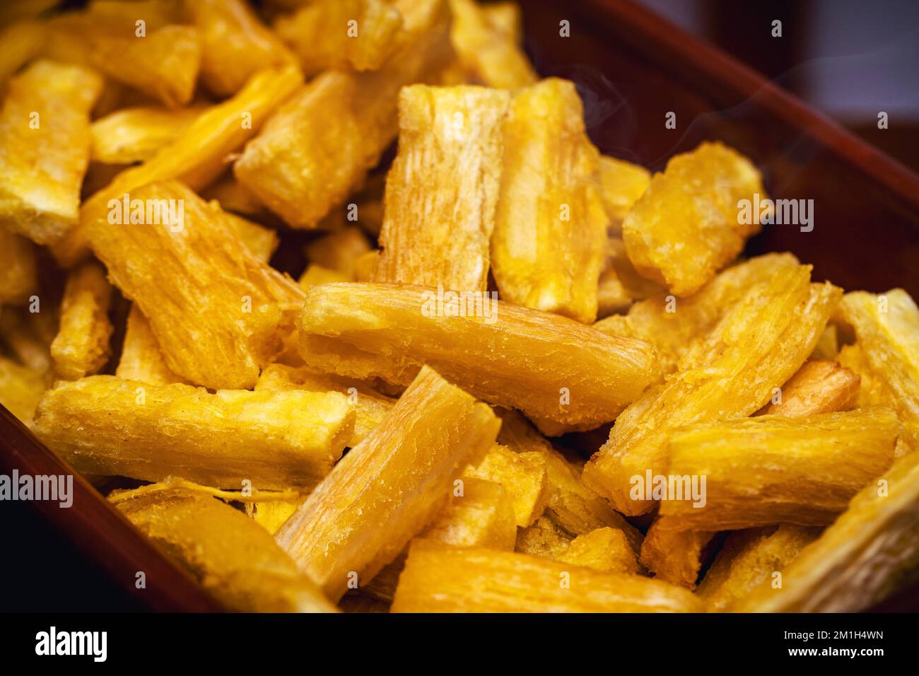 Fried Brazilian manioc, traditional food from Brazil, in an artisan ...